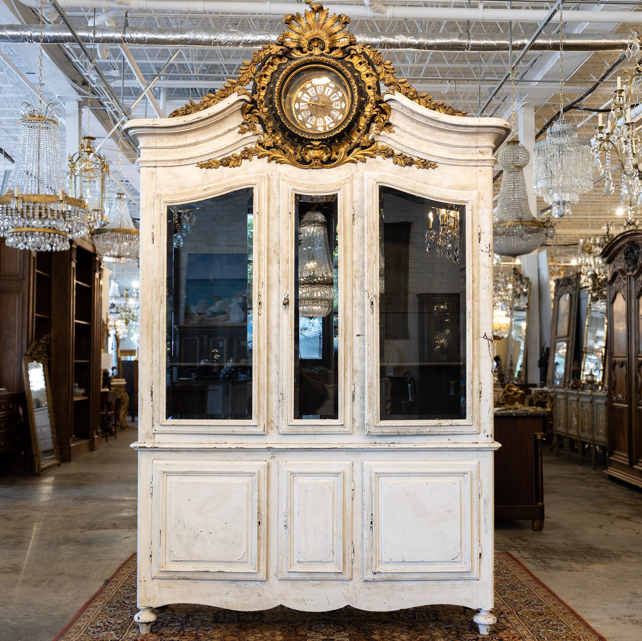 Louis XV Cupboard – Distressed White Finish & Clock Crest – Le Chateau